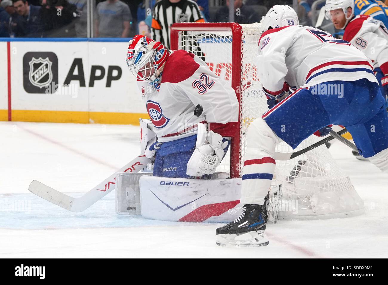 Montreal Canadiens goaltender Jacob Fowler (32) defends the net during ...