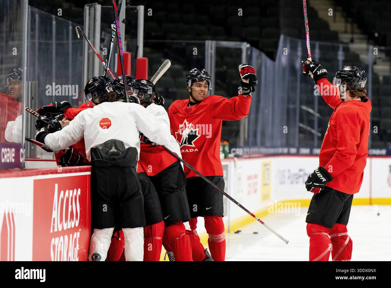 Canada's Kashawn Aitcheson (2) celebrates with teammates at practice ...