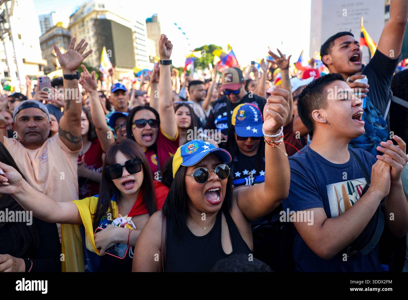 03 January 2026, Argentina, Buenos Aires: Venezuelans gather at the ...