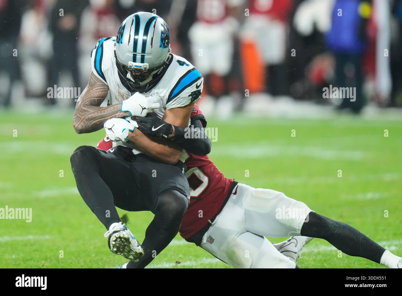 Carolina Panthers wide receiver Tetairoa McMillan (4) makes a catch as ...