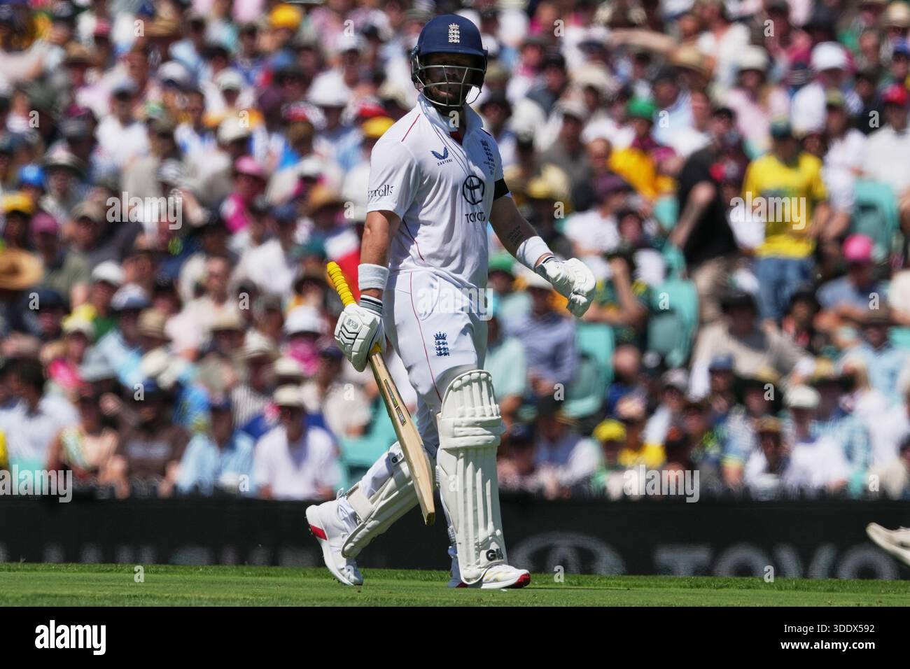 England's Ben Duckett reacts as he walks from the field after he was ...