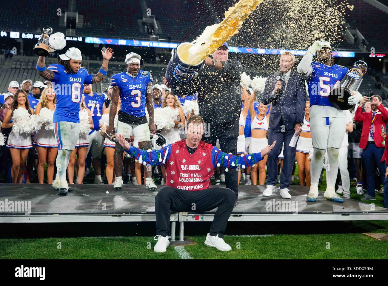 Brian Baumgartner pours eggnog on SMU Mustangs head coach Rhett Lashlee ...