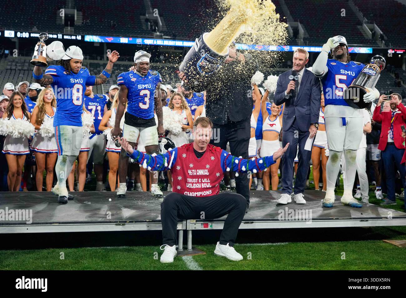 Brian Baumgartner pours eggnog on SMU Mustangs head coach Rhett Lashlee ...