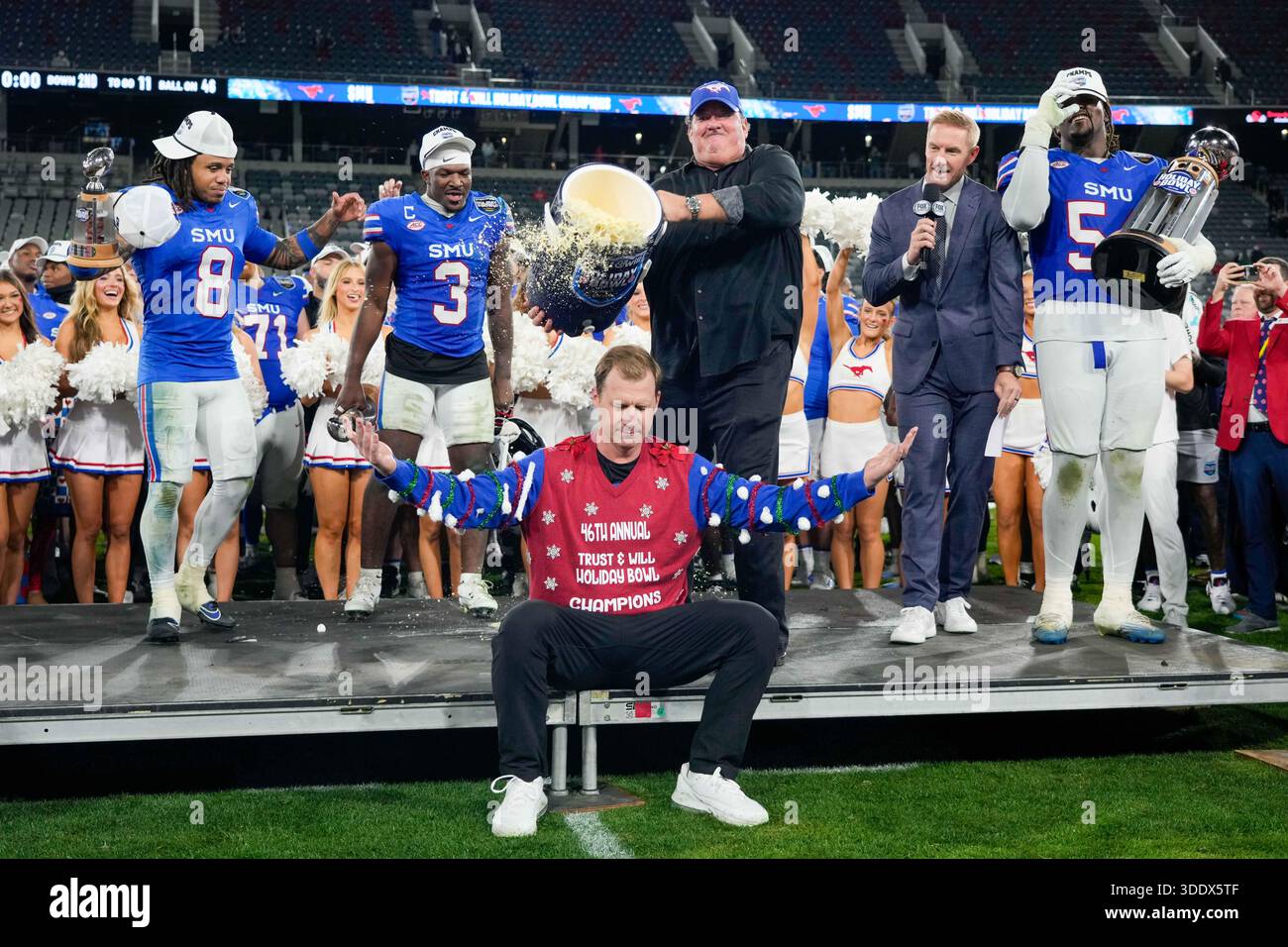 Brian Baumgartner pours eggnog on SMU Mustangs head coach Rhett Lashlee ...