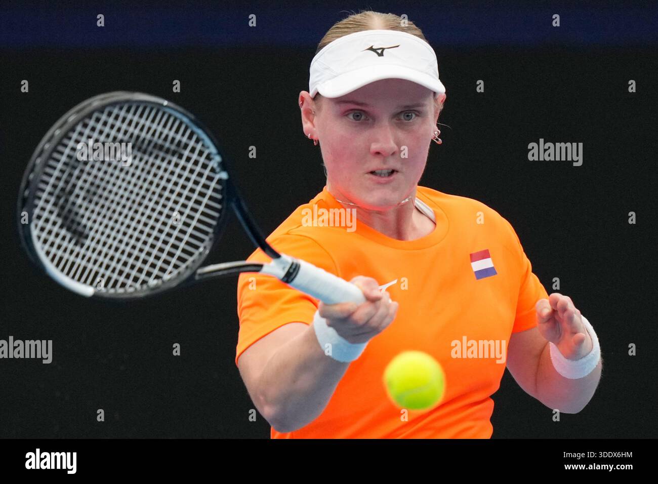 Suzan Lamens of Netherlands plays a forehand to Eva Lys of Germany ...