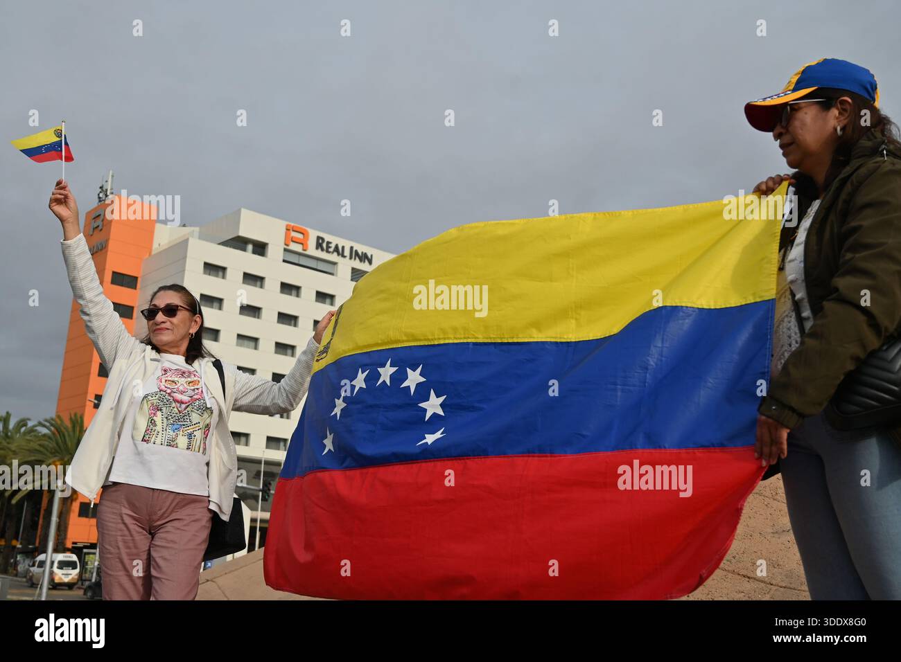 January 3, 2026, Tijuana, Baja California, Mexico: Venezuelans raise ...