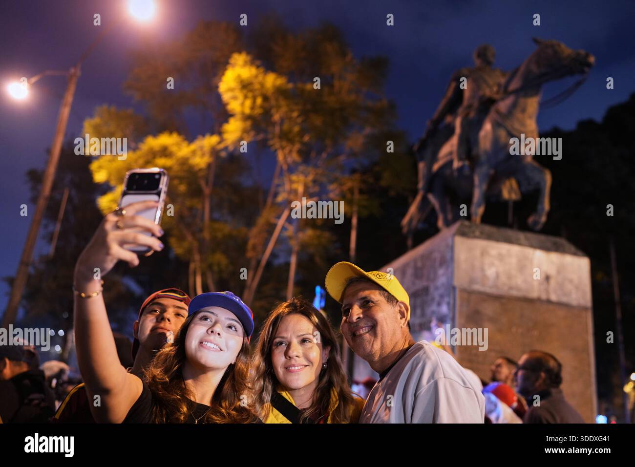 People celebrate in Simon Bolivar square in Guatemala City, Saturday ...