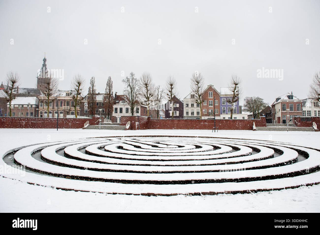 General view of facades and a labyrinth covered in snow. Storm Anna ...