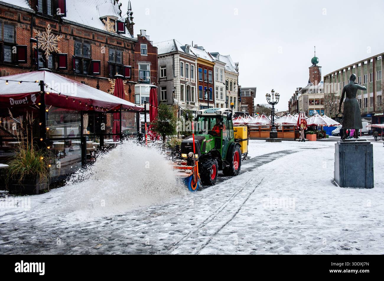 A snowplough is cleaning the ground. Storm Anna brought strong winds ...