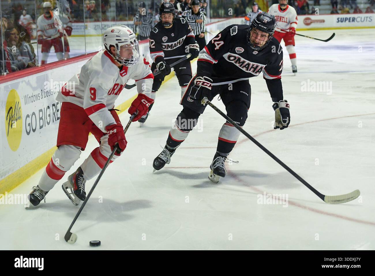 Cornell forward Charlie Major, left, looks to pass while defended by ...