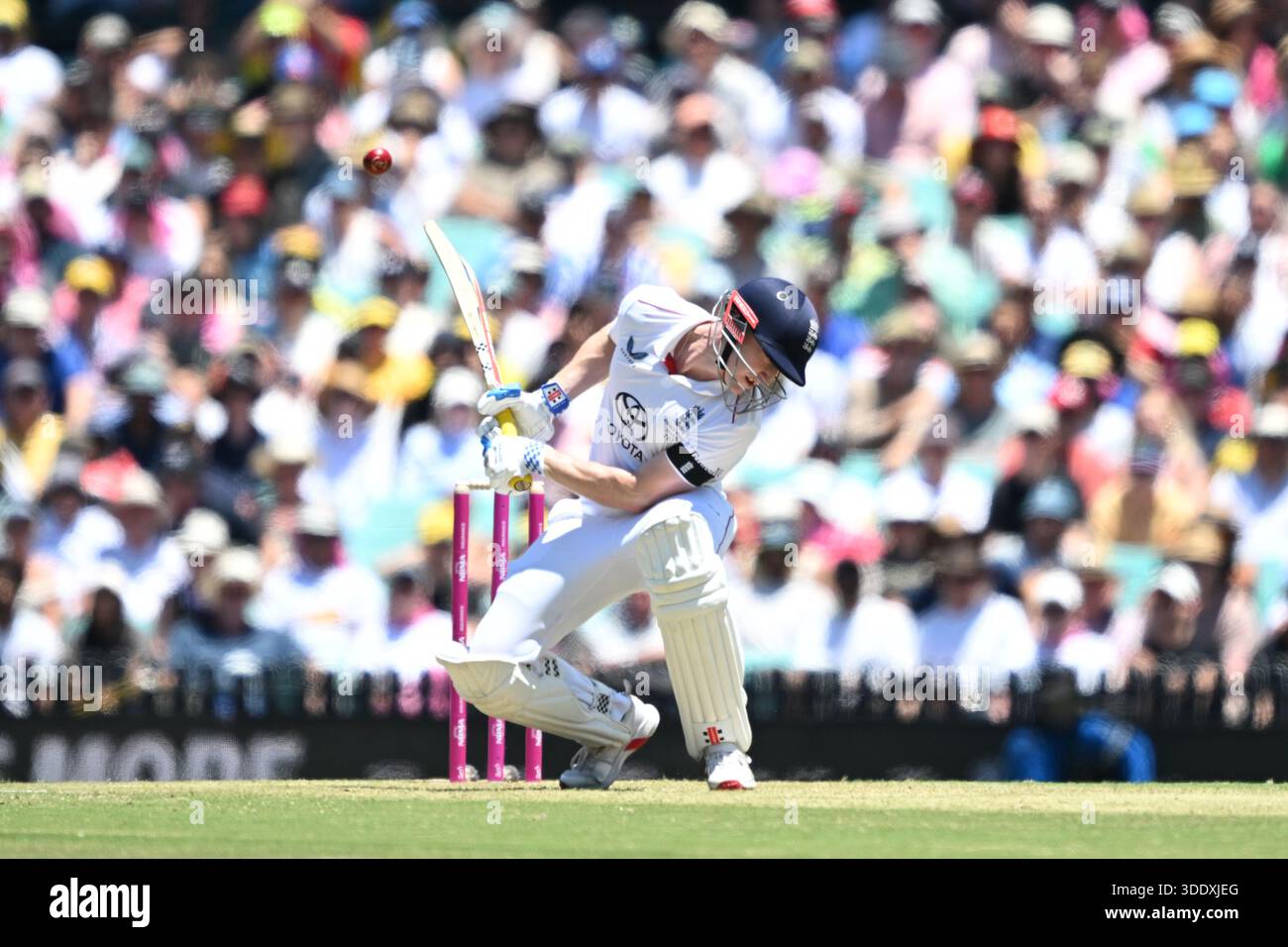 Harry Brook of England ducks a bouncer from Mitchell Starc during Day 1 ...