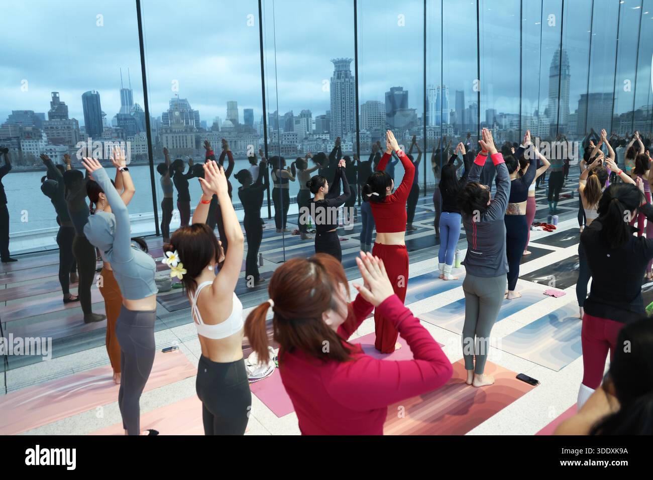 **CHINESE MAINLAND, HONG KONG, MACAU AND TAIWAN OUT**Over 100 yoga ...