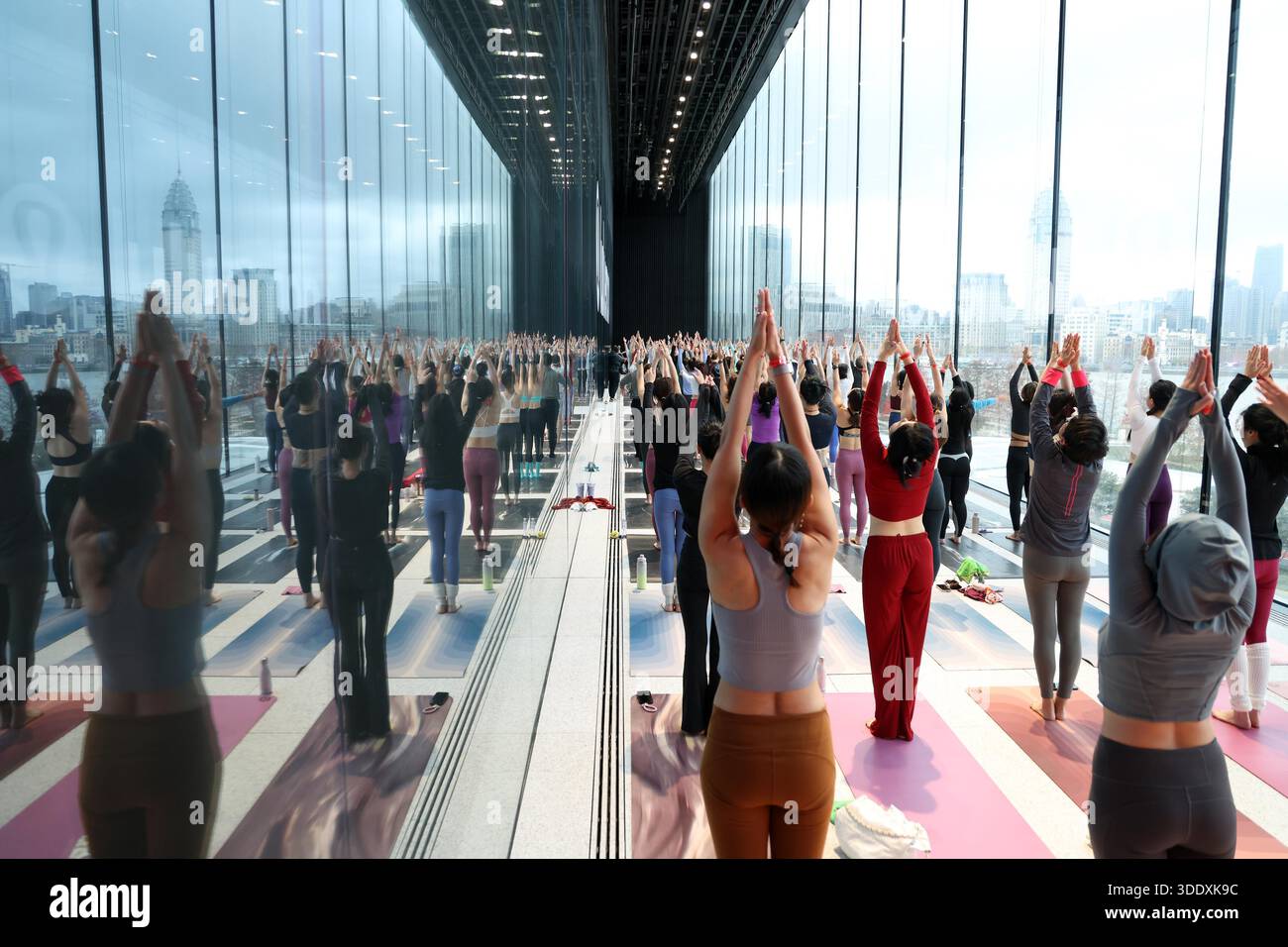 **CHINESE MAINLAND, HONG KONG, MACAU AND TAIWAN OUT**Over 100 yoga ...