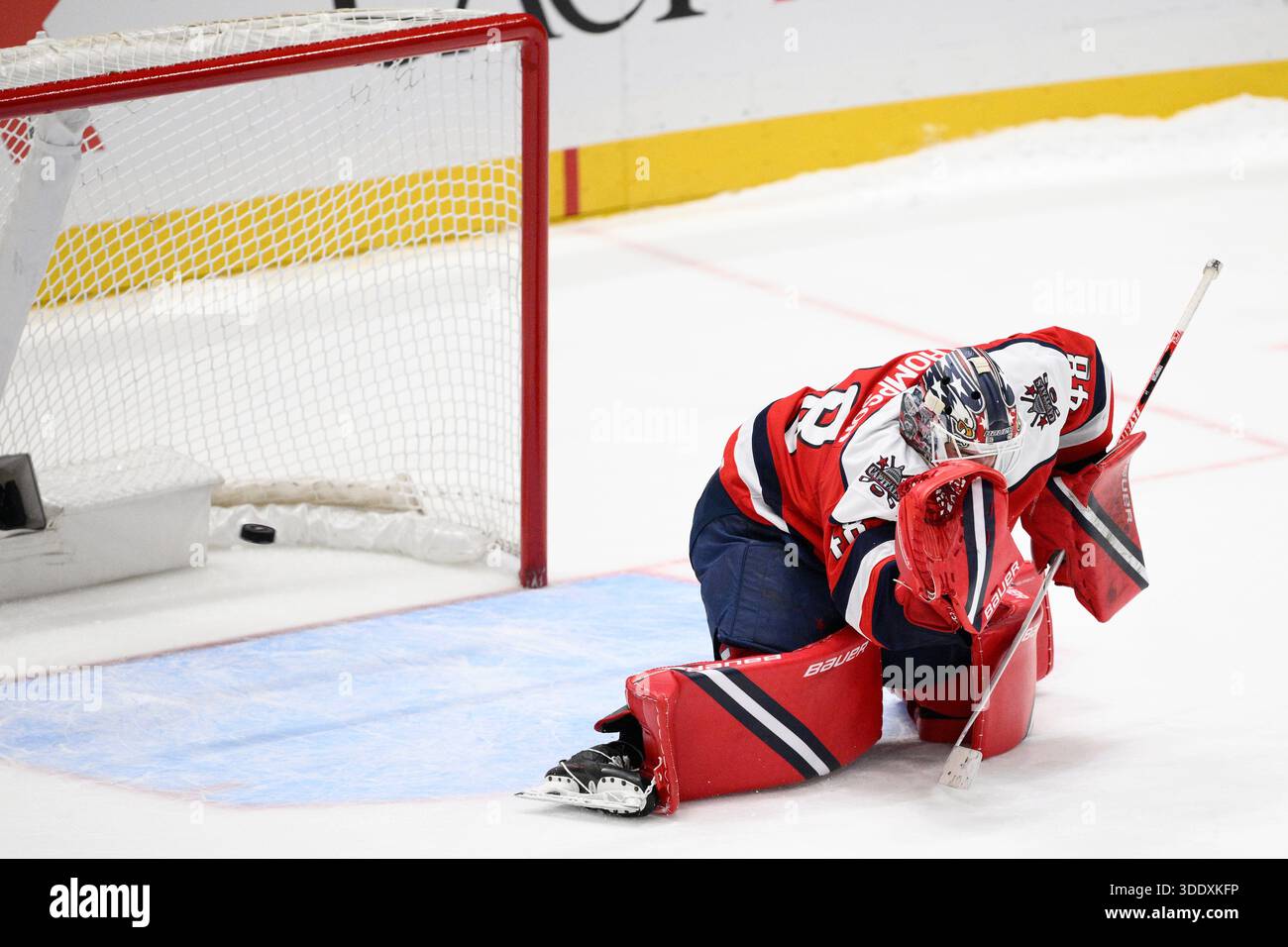 A puck shot by Chicago Blackhawks left wing Nick Foligno gets past ...