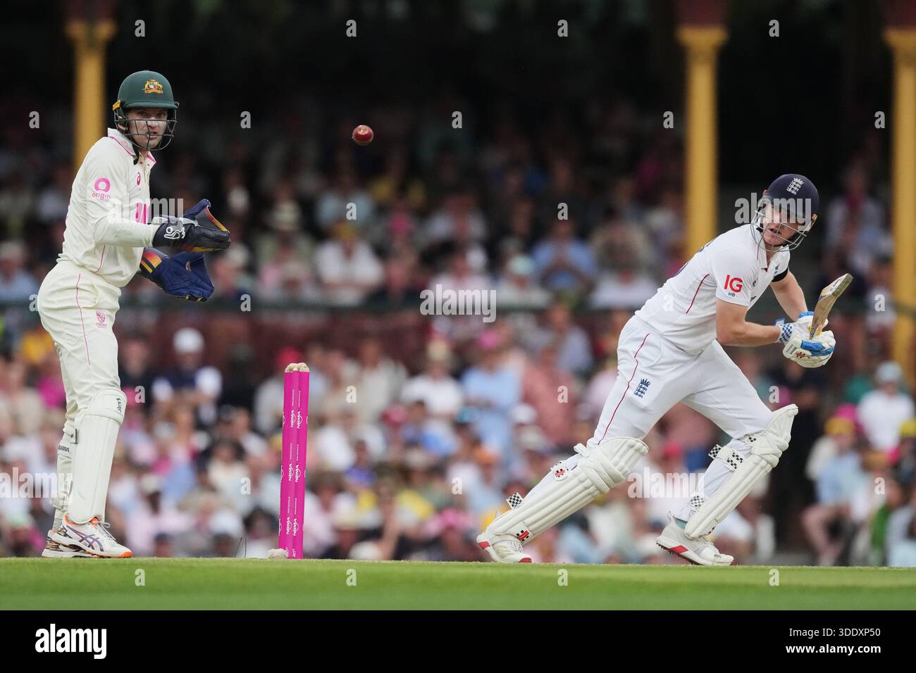 England's Harry Brook bats as Australia's Alex Carey watches during ...