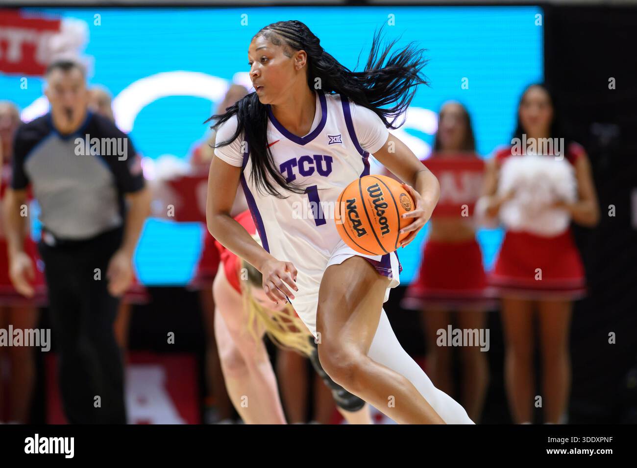 TCU guard Taylor Bigby (1) dribbles during the second half of an NCAA ...