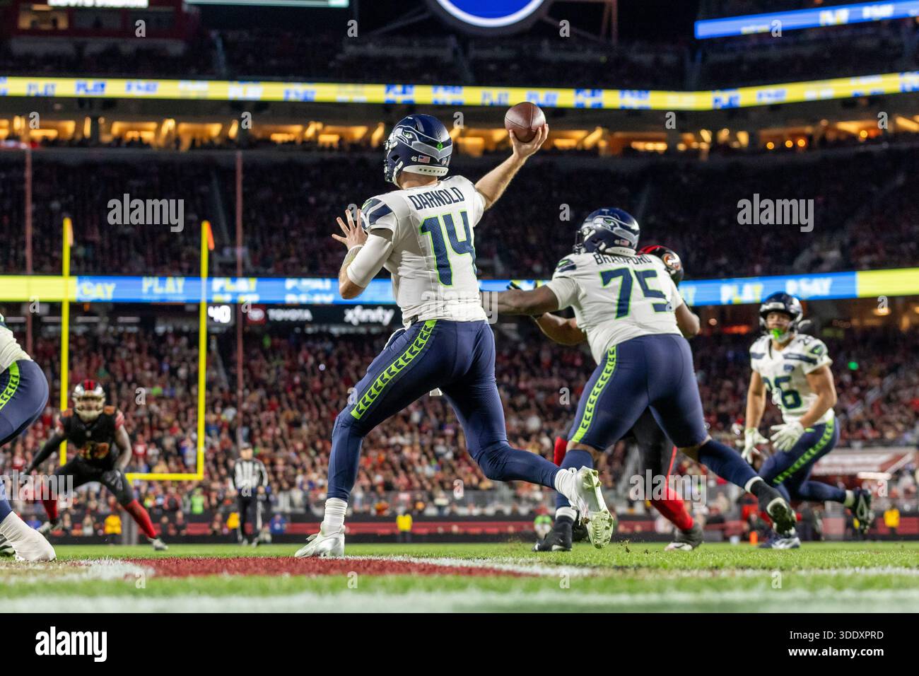 Seattle Seahawks quarterback Sam Darnold (14) passes the ball against ...