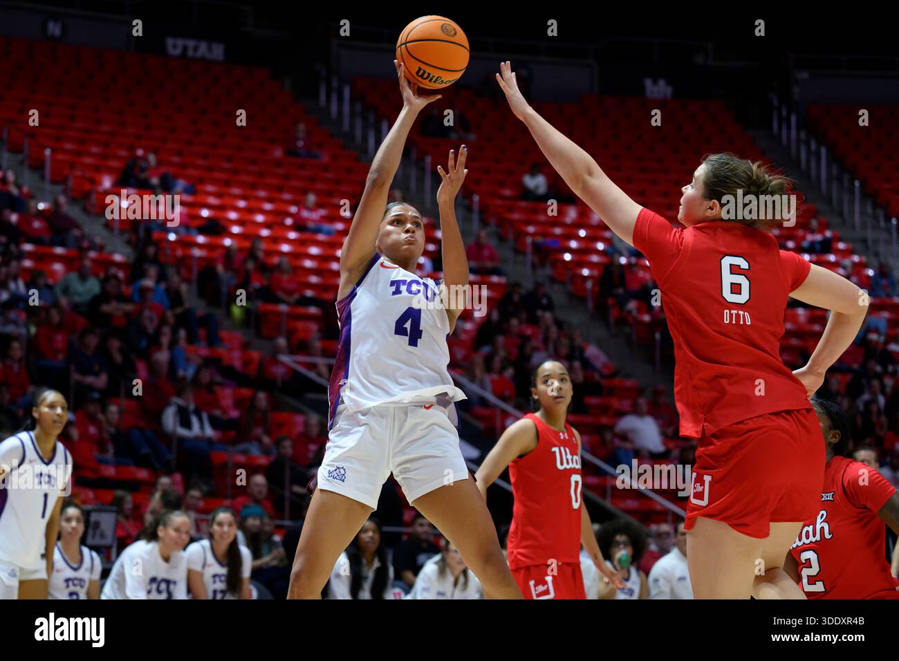 TCU guard Donovyn Hunter (4) shoots over Utah forward Evelina Otto (6 ...