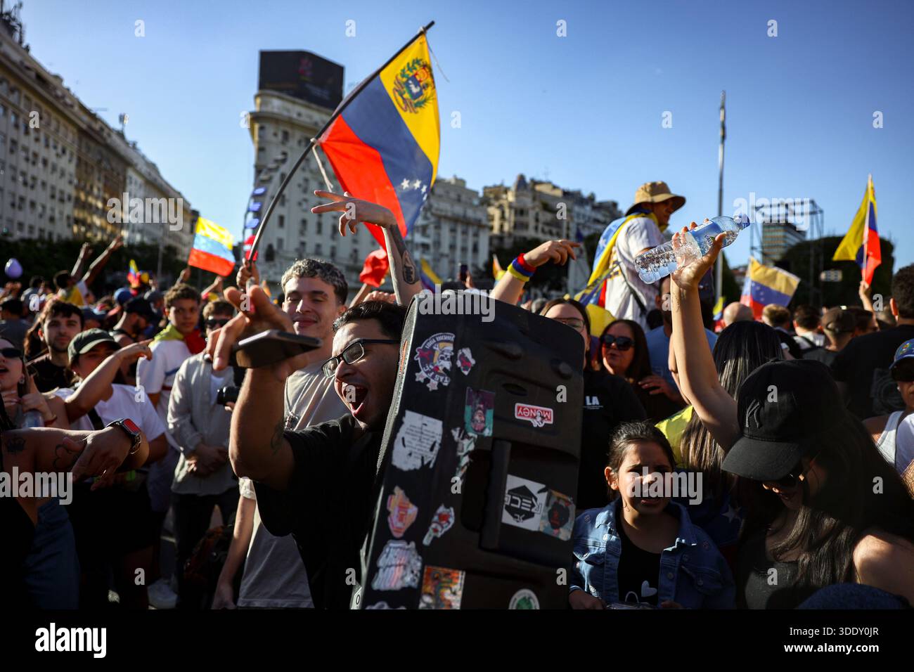 03 January 2026, Argentina, Buenos Aires: Venezuelans gather at the ...
