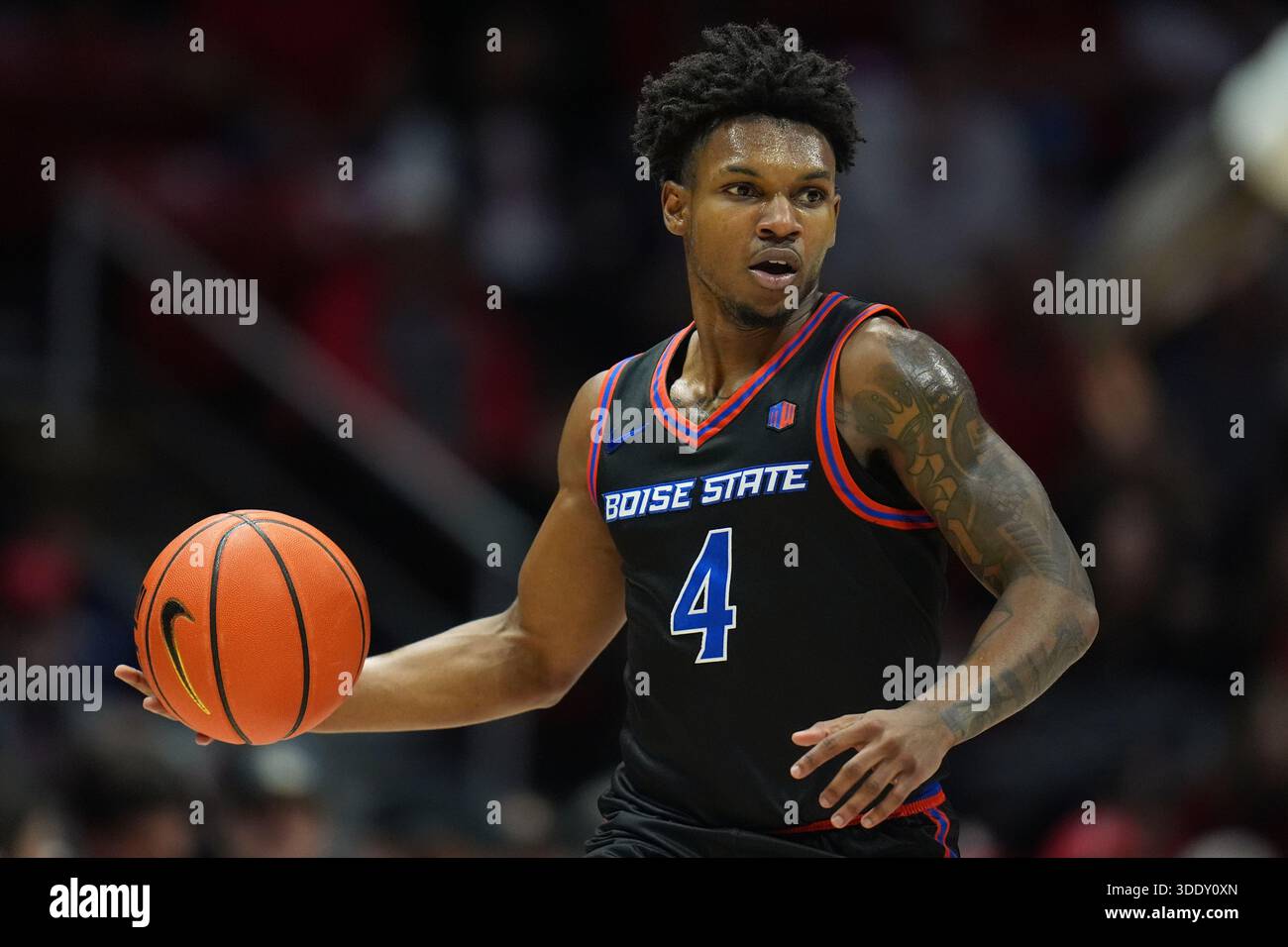 Boise State guard Dylan Andrews brings the ball up court during the ...