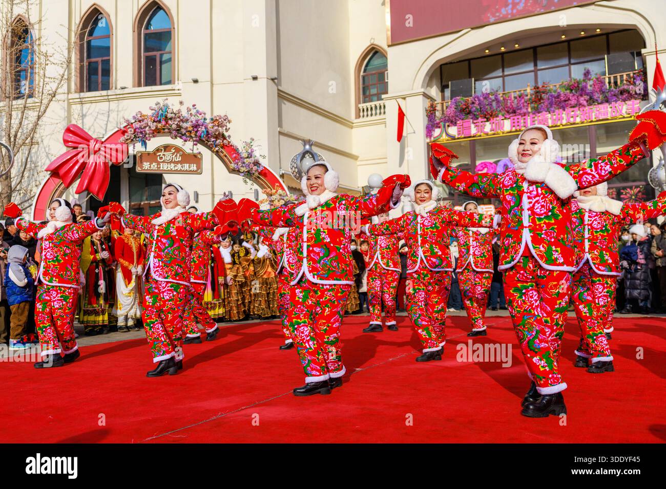 A shehuo team performs for tourists at the Grand Bazaar pedestrian ...