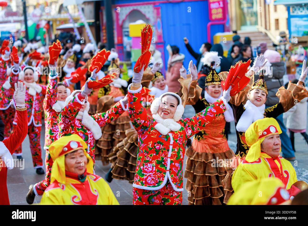 A shehuo team performs for tourists at the Grand Bazaar pedestrian ...