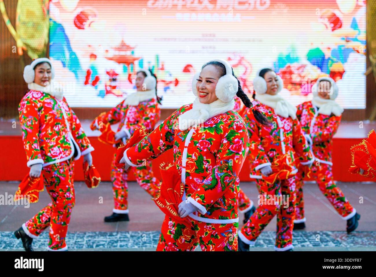 A shehuo team performs for tourists at the Grand Bazaar pedestrian ...