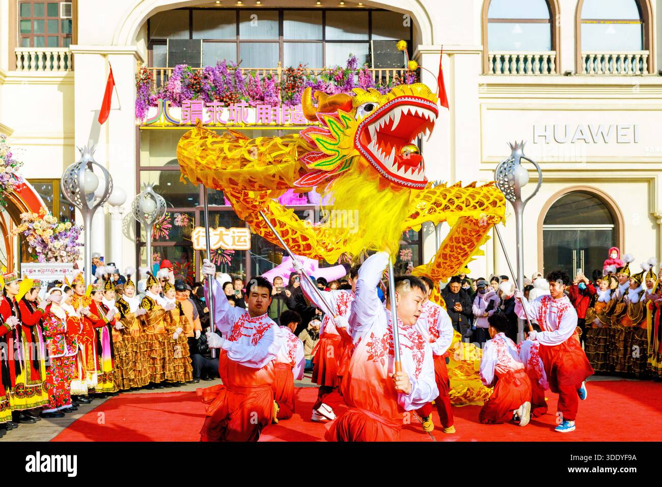 A shehuo team performs for tourists at the Grand Bazaar pedestrian ...