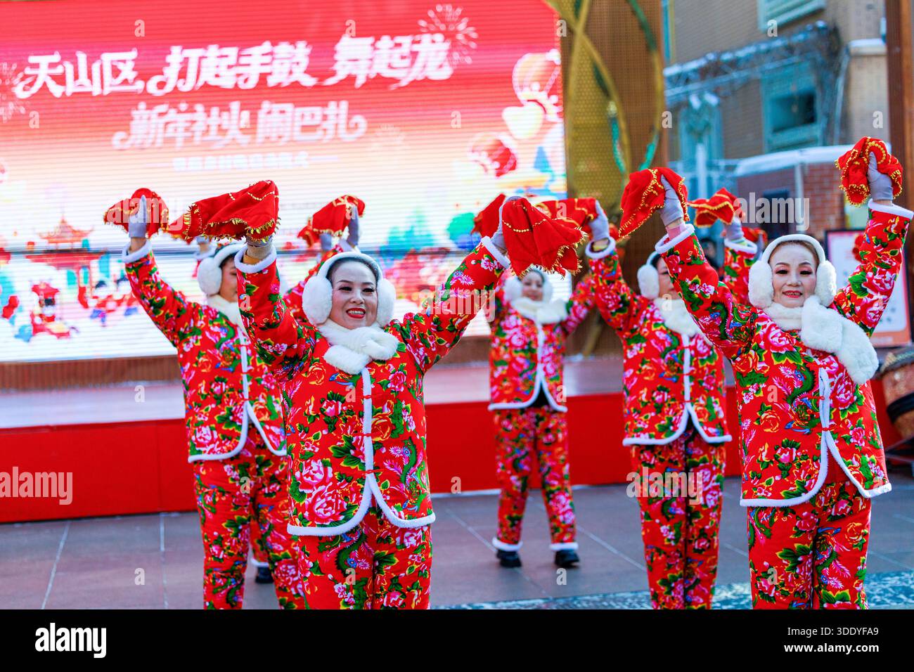 A shehuo team performs for tourists at the Grand Bazaar pedestrian ...