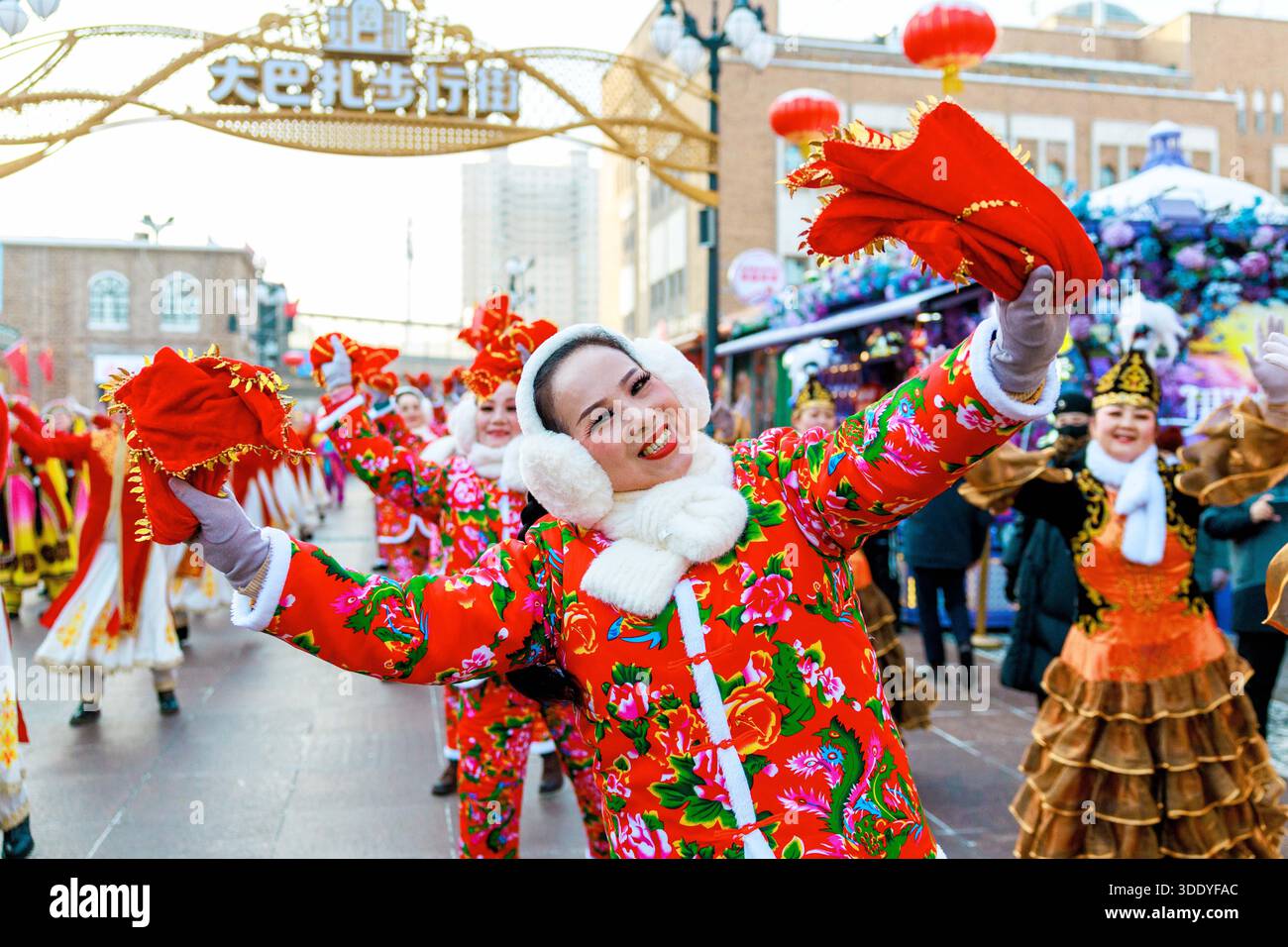 A shehuo team performs for tourists at the Grand Bazaar pedestrian ...