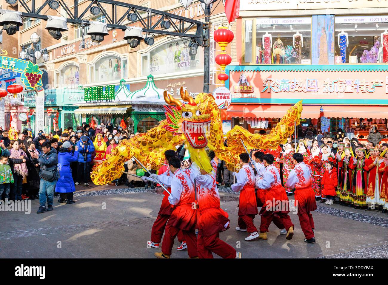 A shehuo team performs for tourists at the Grand Bazaar pedestrian ...