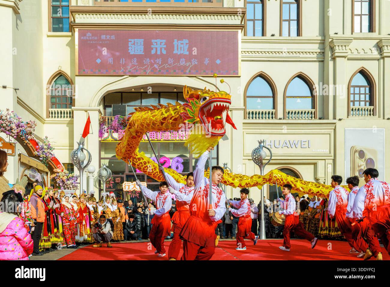 A shehuo team performs for tourists at the Grand Bazaar pedestrian ...