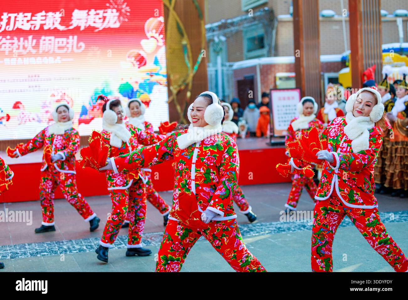 A shehuo team performs for tourists at the Grand Bazaar pedestrian ...