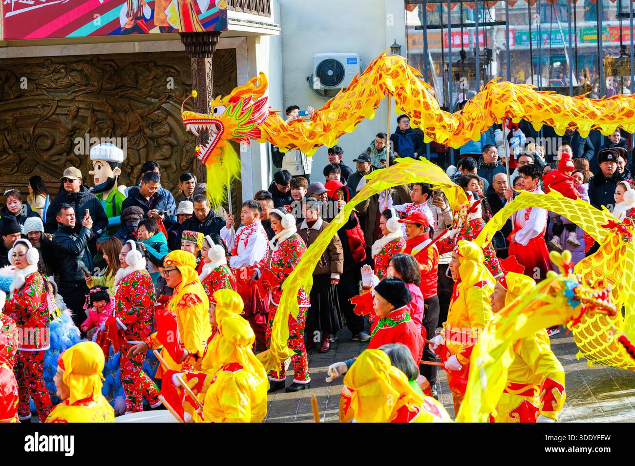 A shehuo team performs for tourists at the Grand Bazaar pedestrian ...