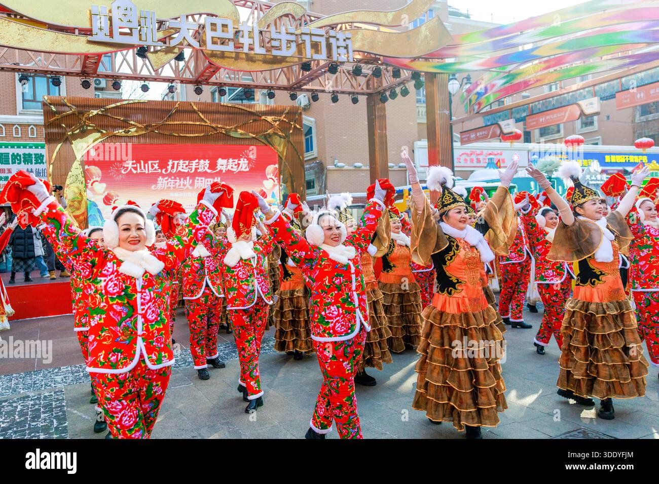 A shehuo team performs for tourists at the Grand Bazaar pedestrian ...