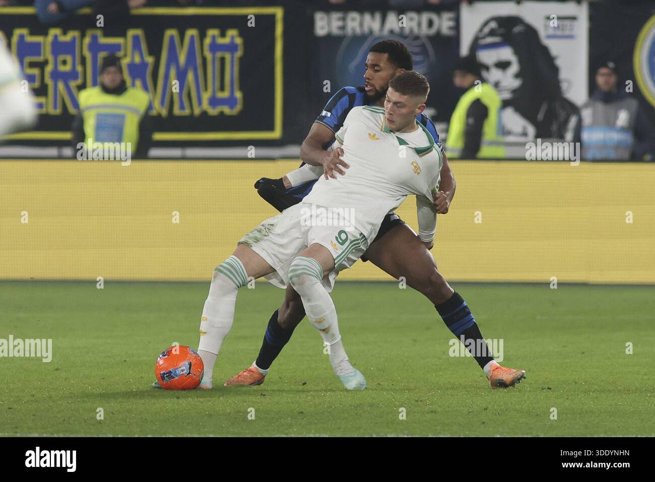 Artem Dovbyk of AS Roma, battle for the ball with Isak Hien of Atalanta ...