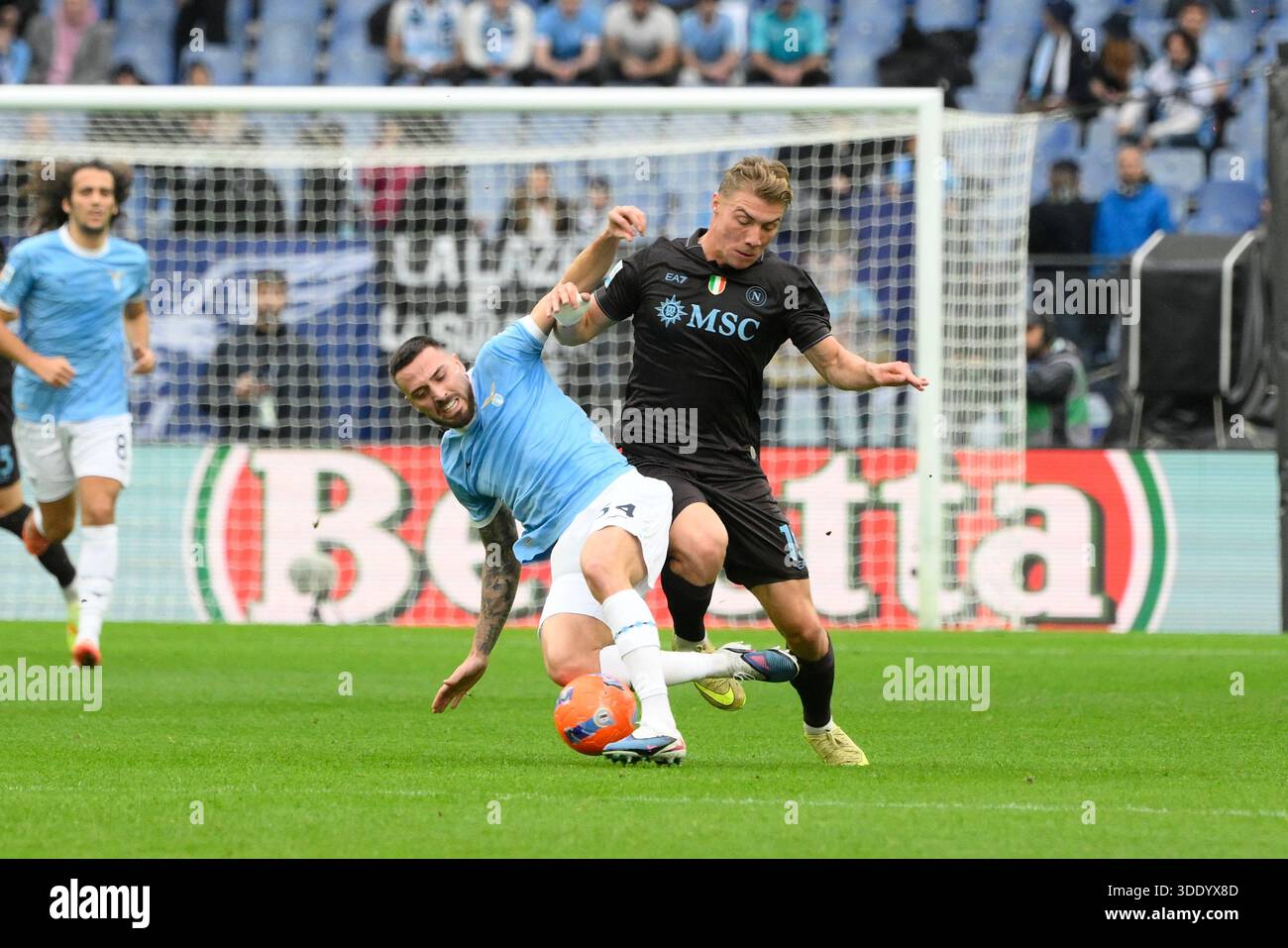 Napoli's Rasmus Hojlund, right, and Lazio's Mario Gila battle for the ...