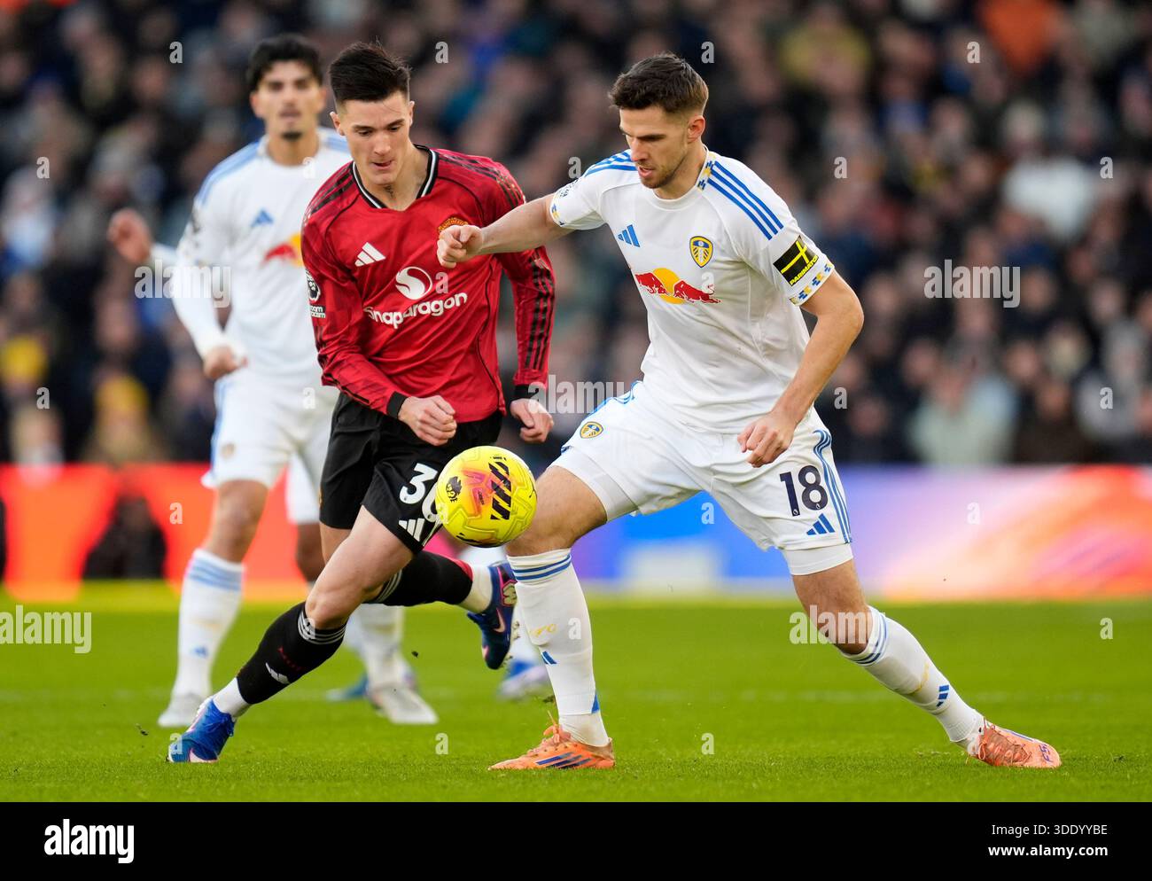 Manchester United's Benjamin Sesko (left) and Leeds United's Anton ...