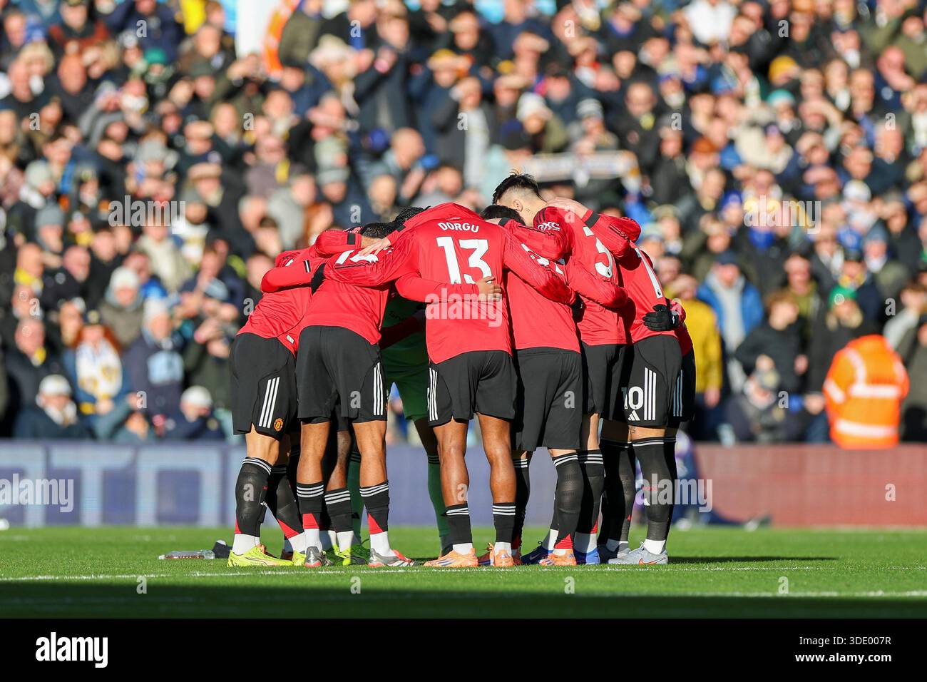 Manchester United defender Patrick Dorgu (13) in team huddle during the ...