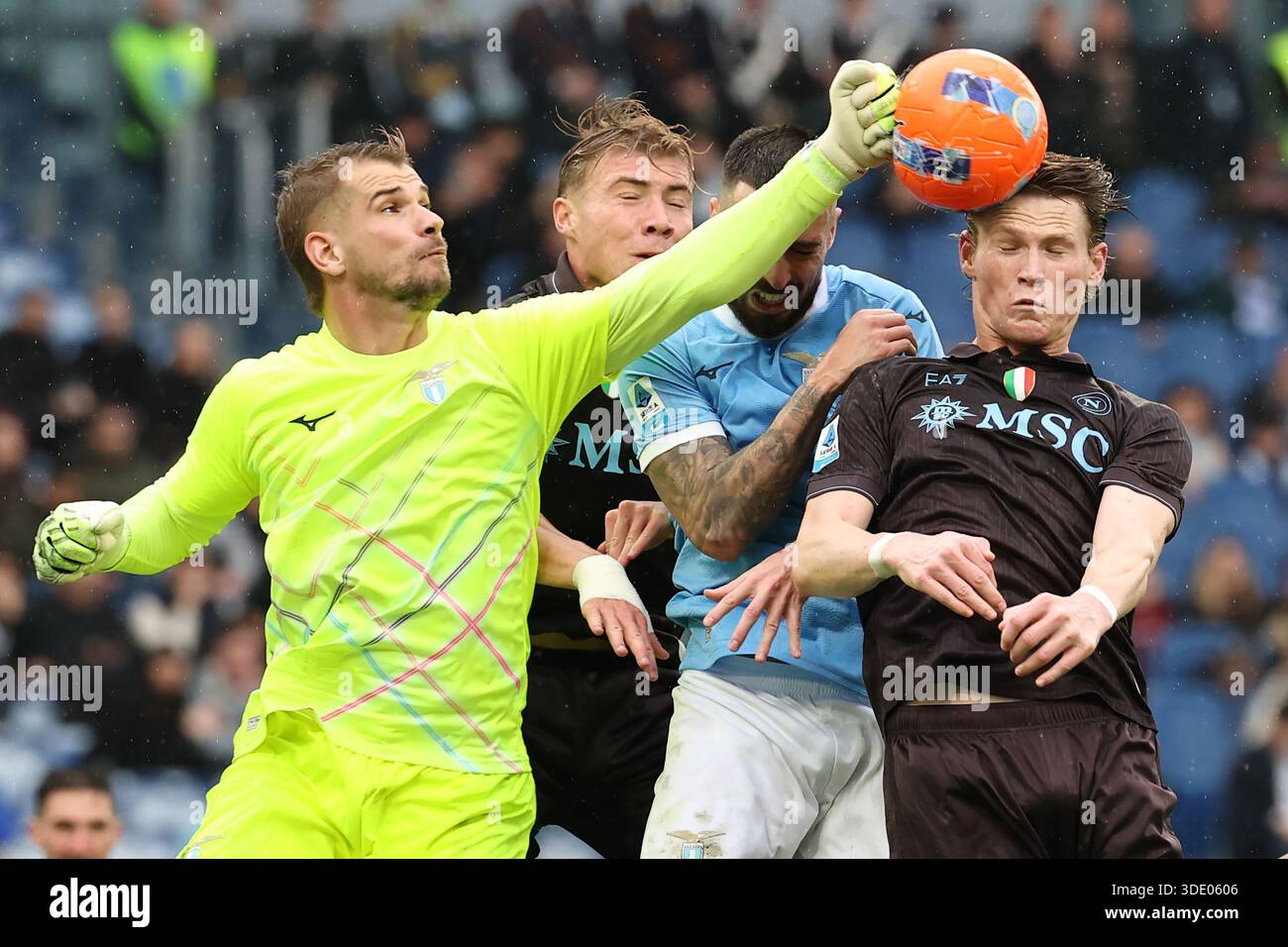 Ivan Provedel of SS Lazio and Scott McTominay of SSC Napoli compete for ...