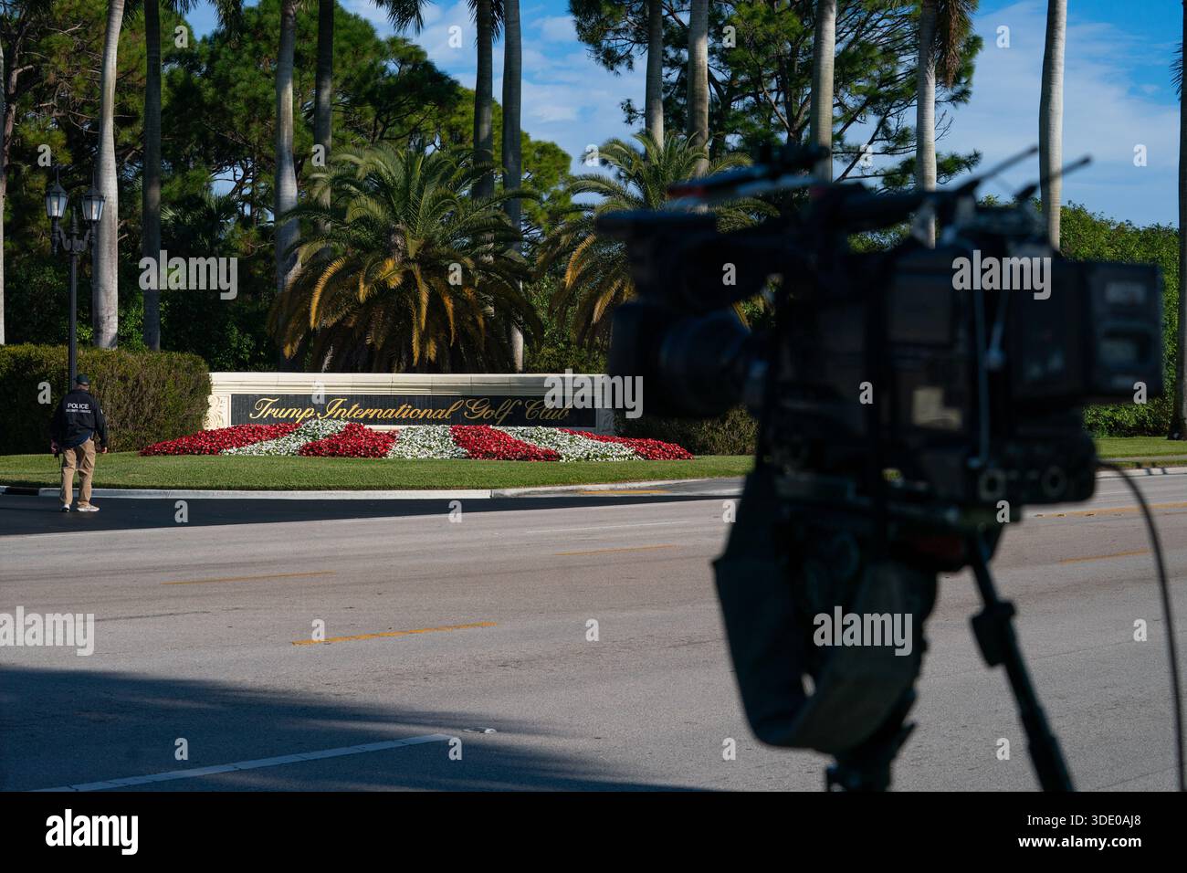 Media and a police officer stage ahead of President Donald Trump's ...