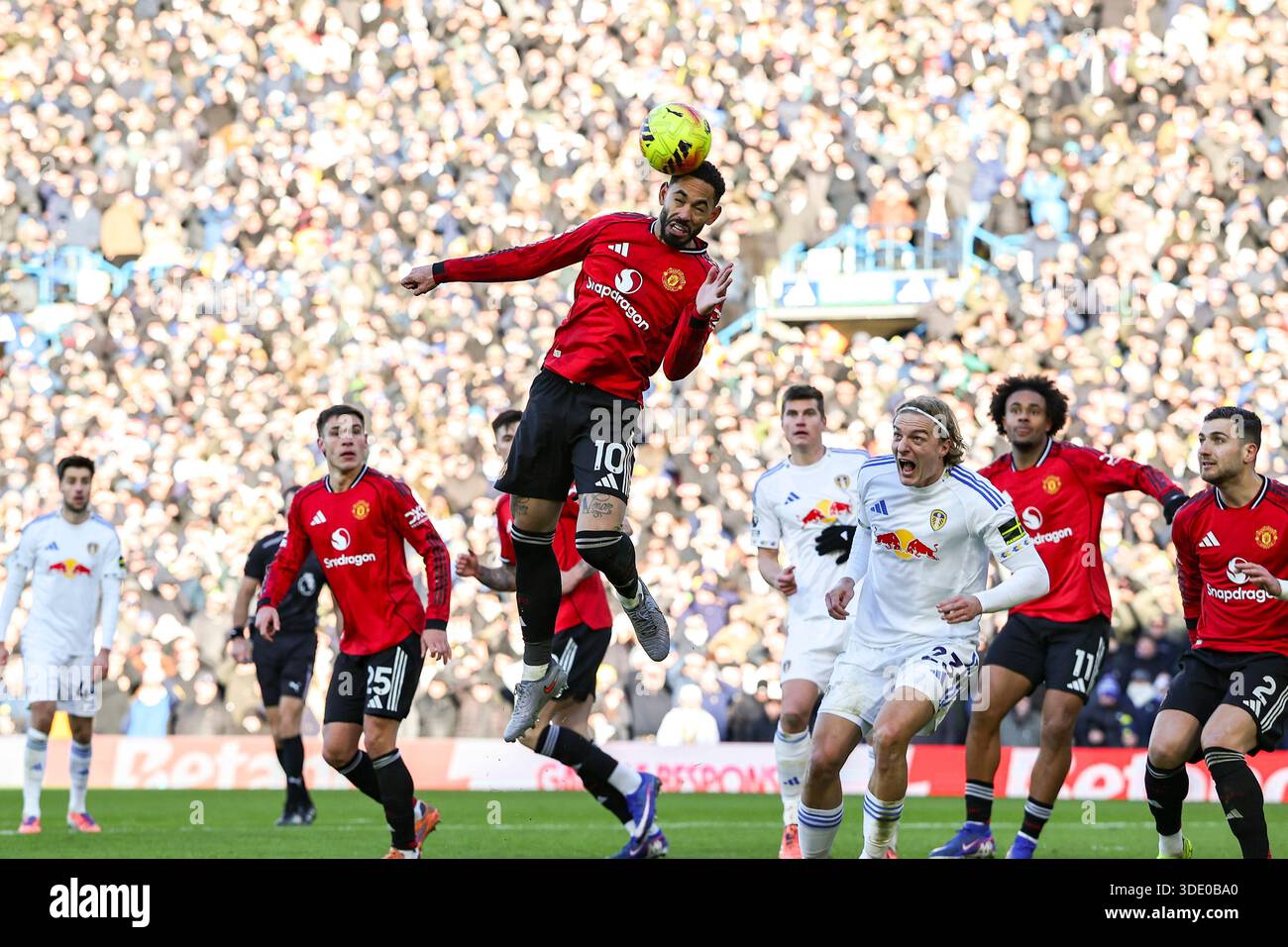 Manchester United forward Matheus Cunha (10) heads the ball during the ...