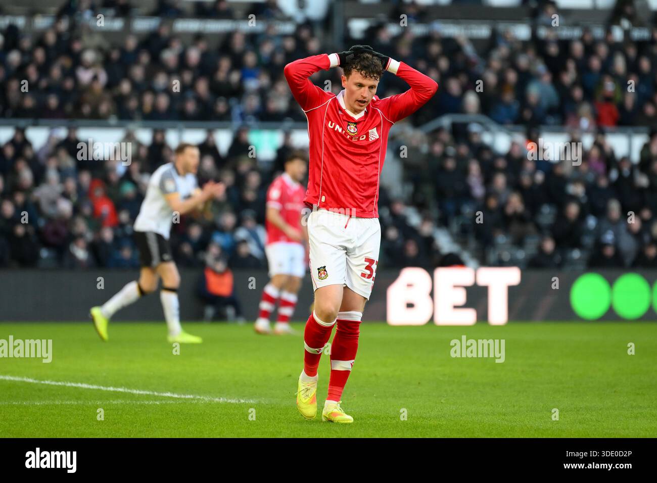 Nathan Broadhead of Wrexham reacts after a missed opportunity at goal ...