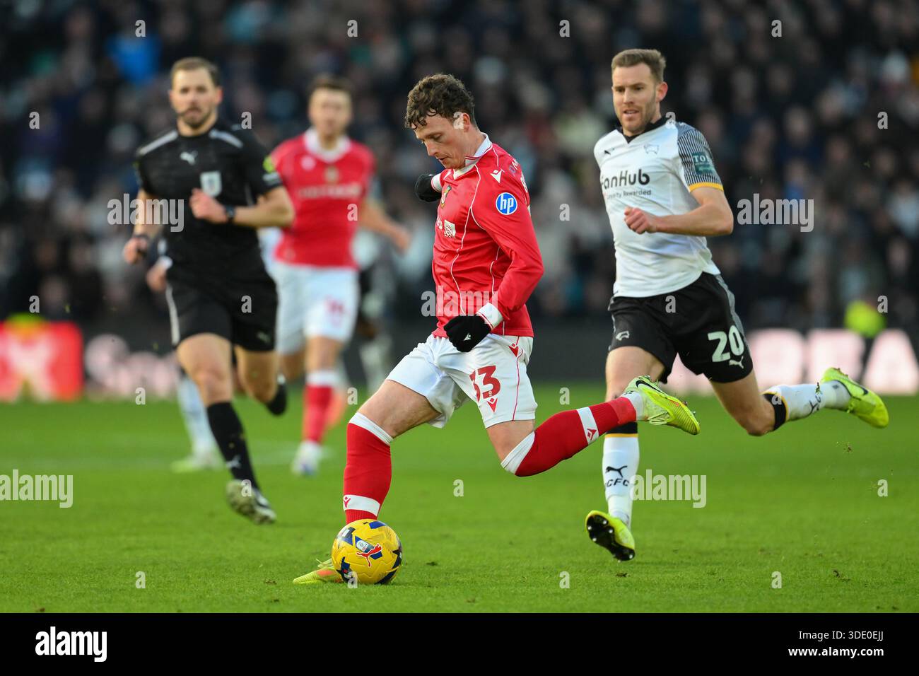 Nathan Broadhead of Wrexham lines up a cross during the Sky Bet ...