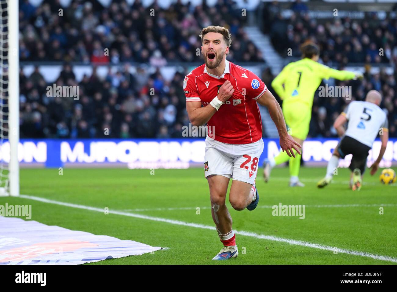 Sam Smith of Wrexham celebrates after scoring a goal to make it 0-1 ...