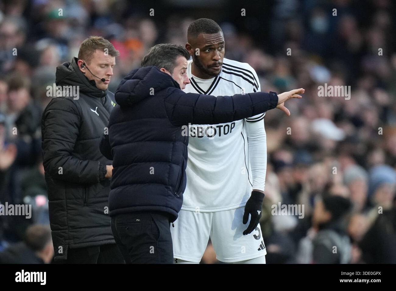 Fulham's Issa Diop speaks to Fulham's head coach Marco Silva during the ...