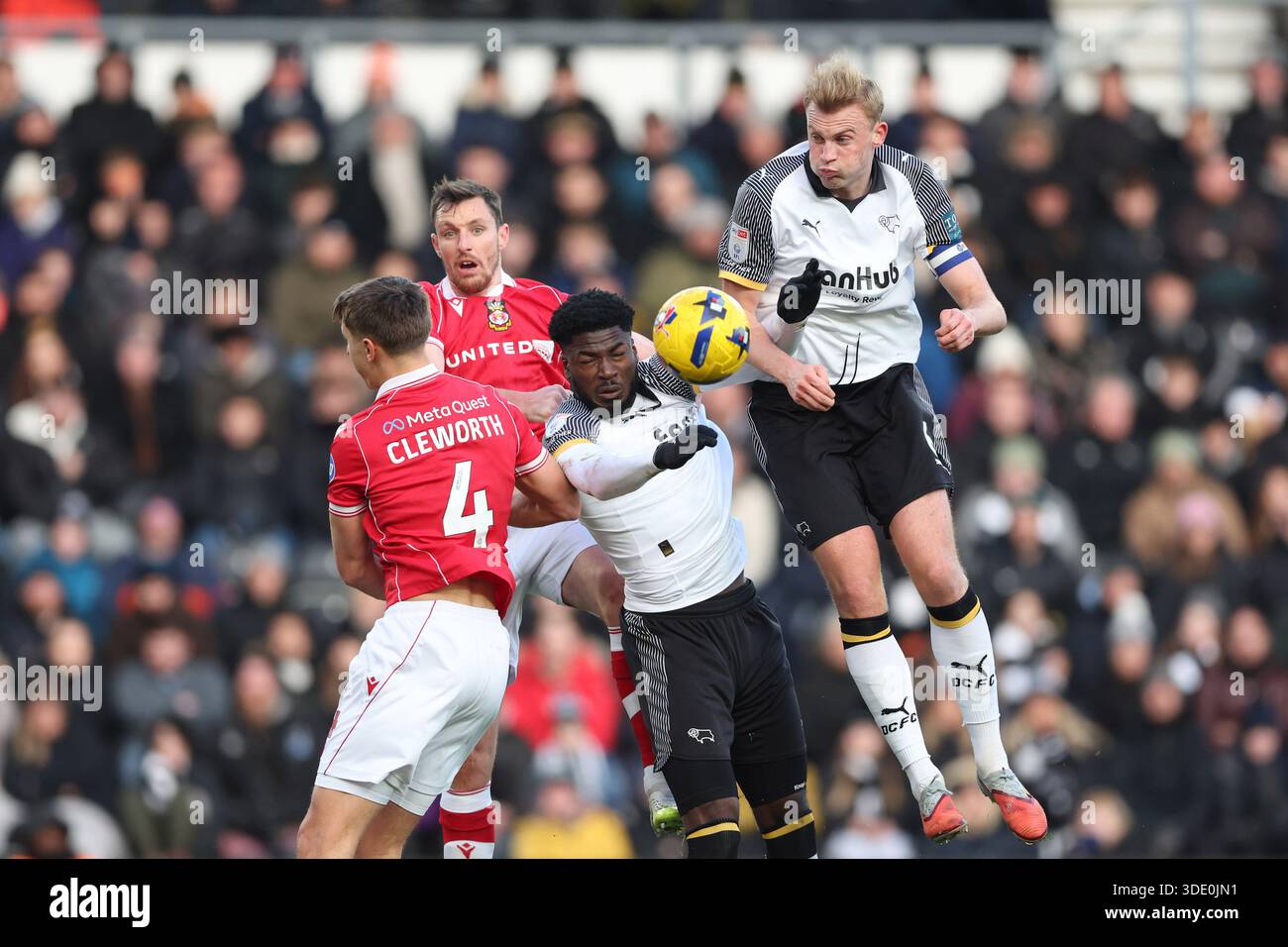 (Left to right) Wrexham's Max Cleworth and Dominic Hyam and Derby ...