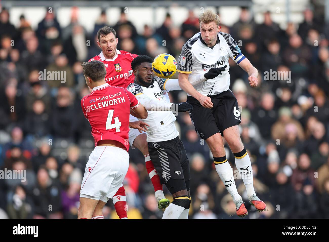(Left to right) Wrexham's Max Cleworth and Dominic Hyam and Derby ...