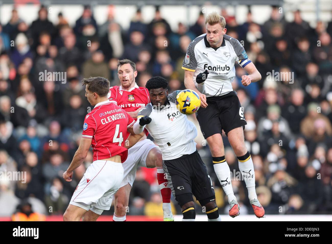 (Left to right) Wrexham's Max Cleworth and Dominic Hyam and Derby ...