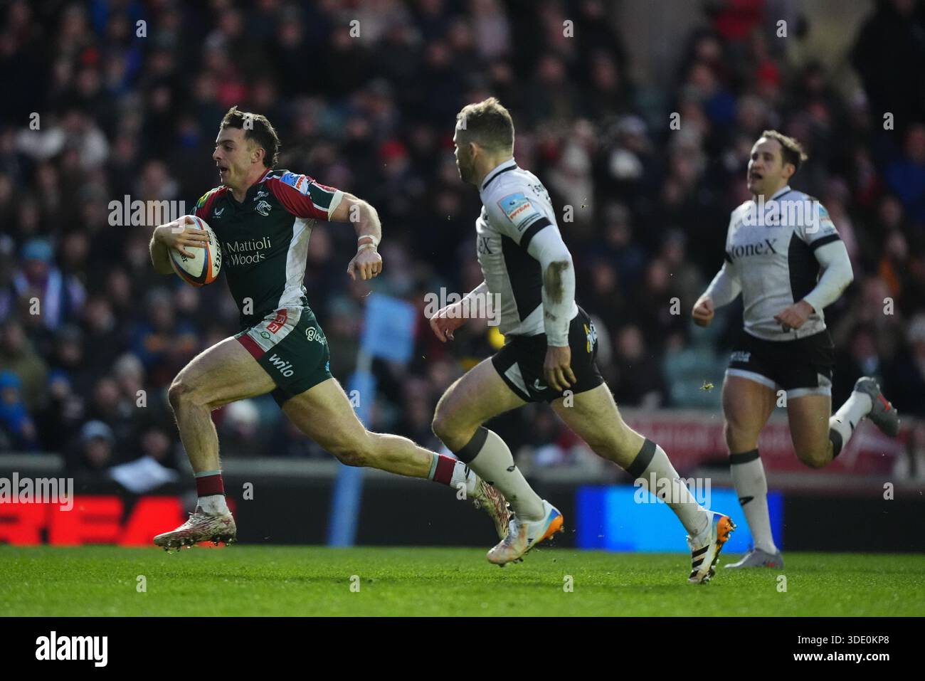 Leicester Tigers' Adam Radwan (left) in action during the Gallagher ...